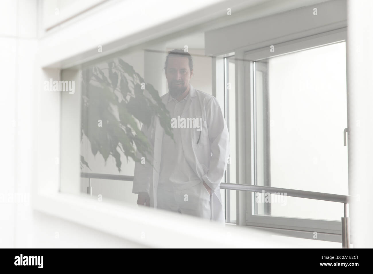 portrait of an male doctor, surgeon or medic professional, indoors ...