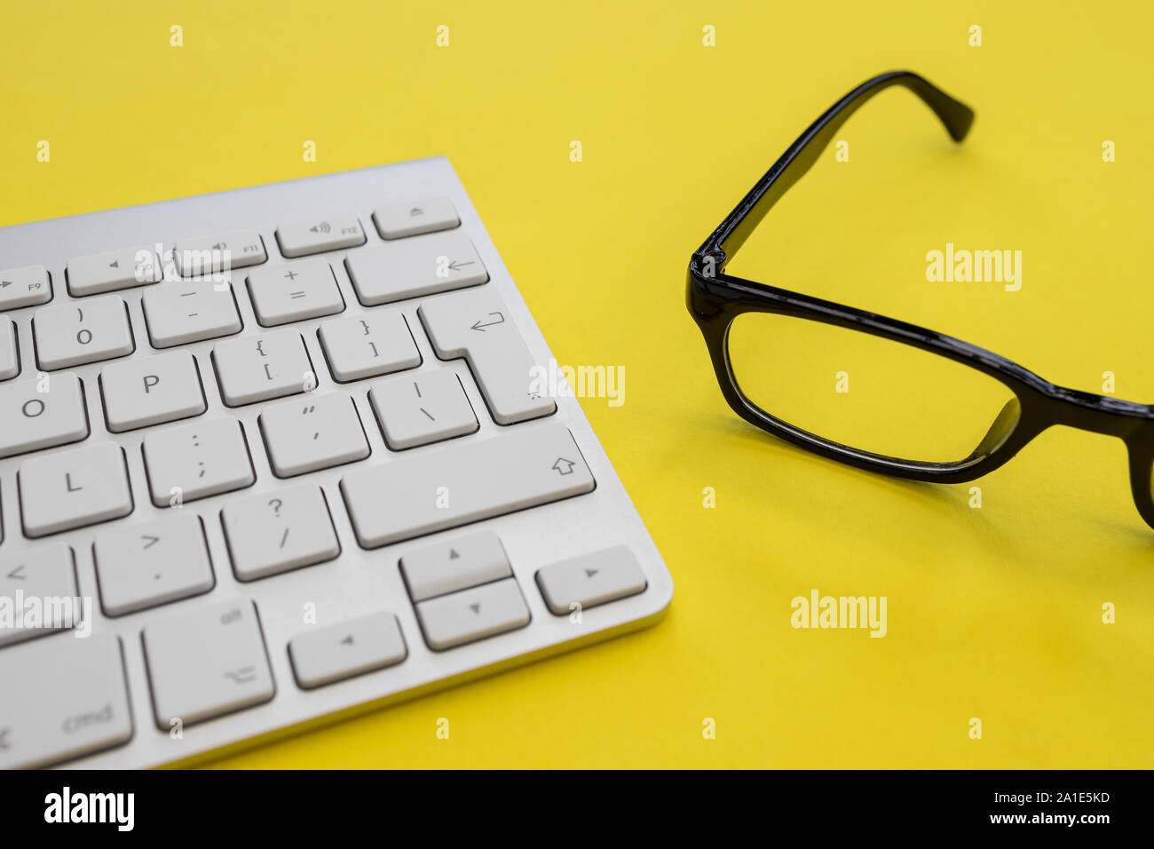 Computer keyboard glasses minimal home office bright yellow color ...