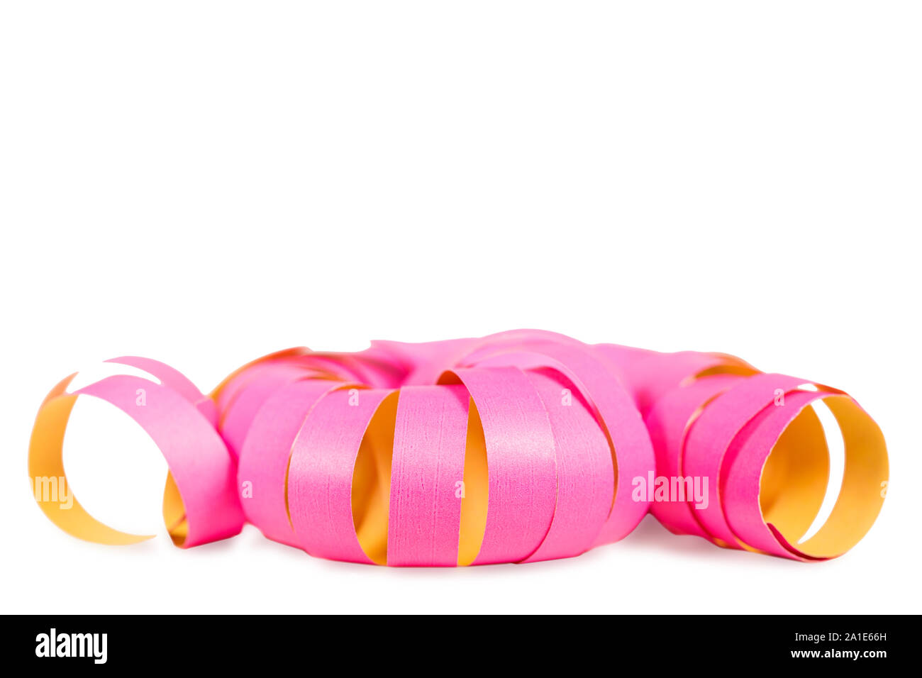 one pink curled streamer, isolated on white background Stock Photo - Alamy