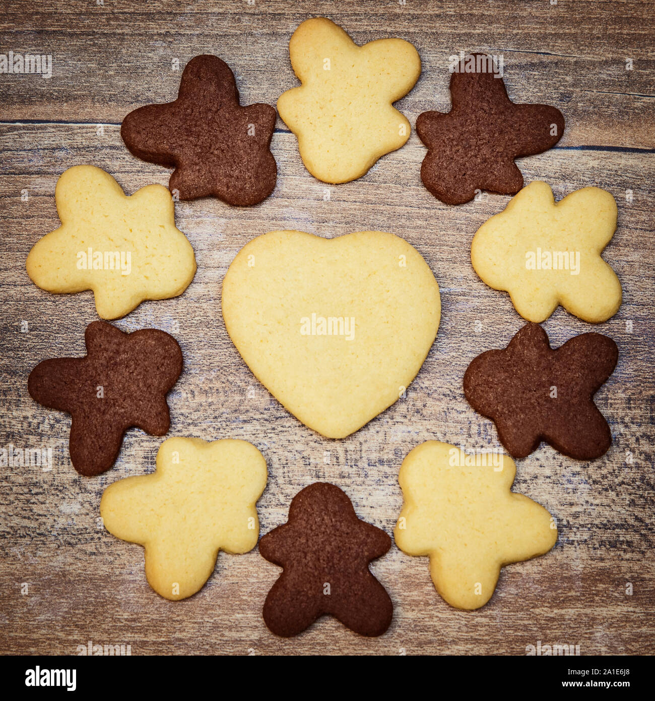 Human and heart shape cookies in a circle, concept peace and love ...