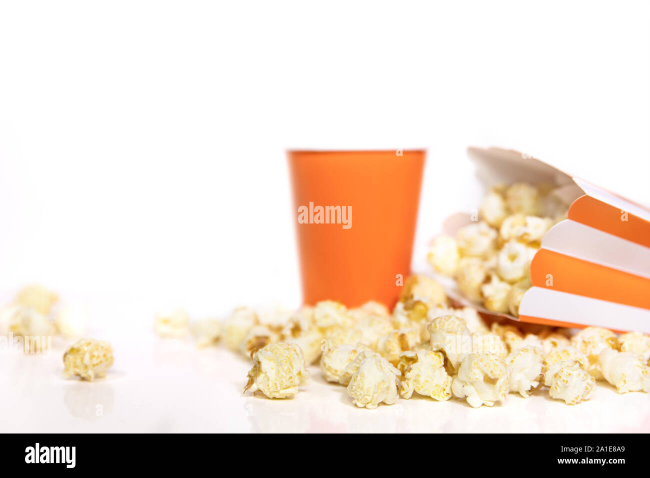 striped Popcorn box in front of white background, concept funfair and ...