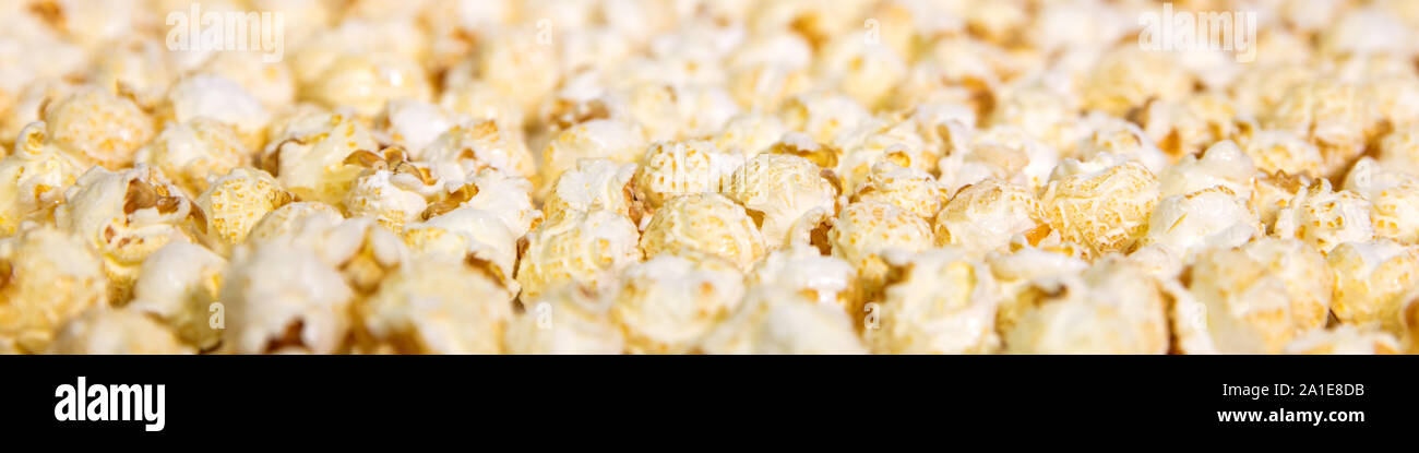 Panorama, lots of fresh popcorn background, concept funfair and movie ...