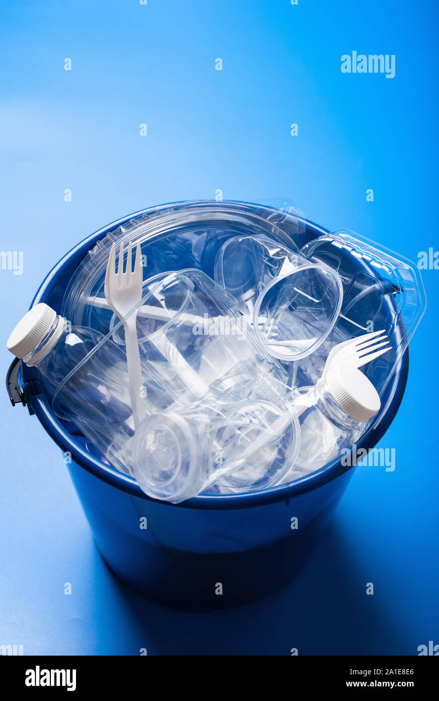 clean recyclable plastic bottles, containers, cups in garbage bin ...