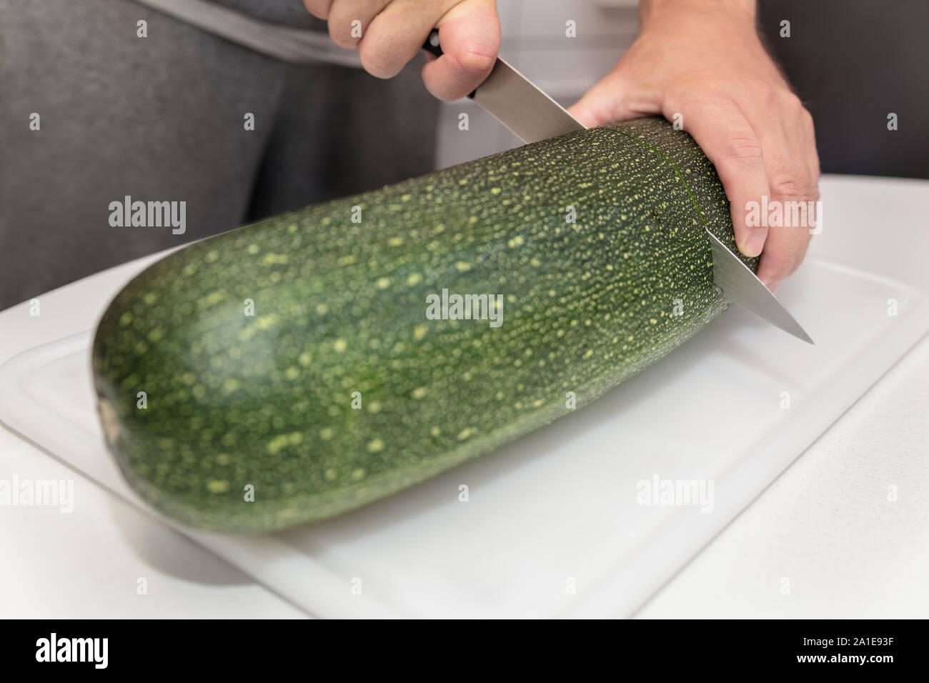 Cutting with big knife hi-res stock photography and images - Alamy