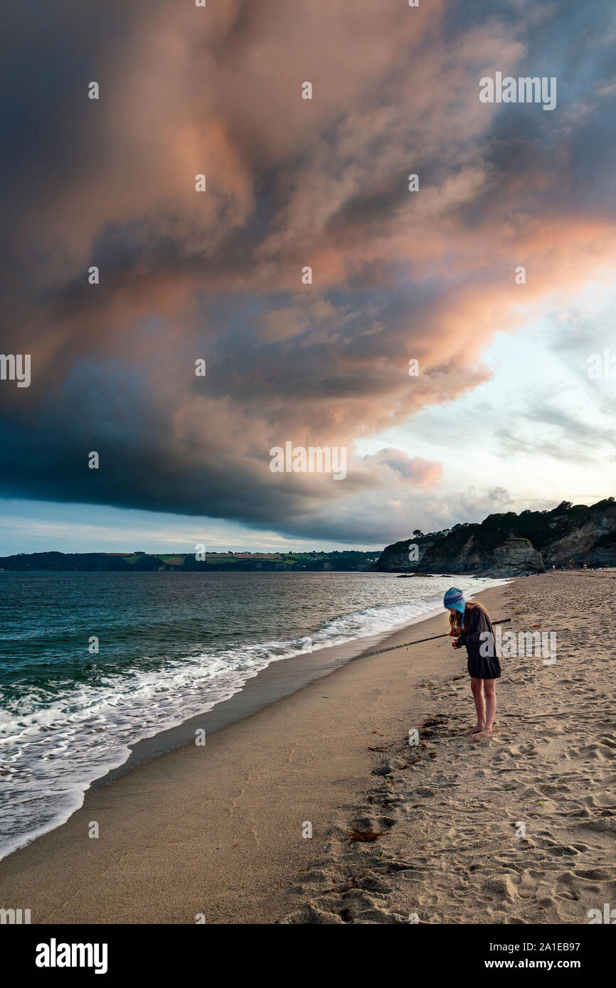 Woman fishing off beach hi-res stock photography and images - Alamy