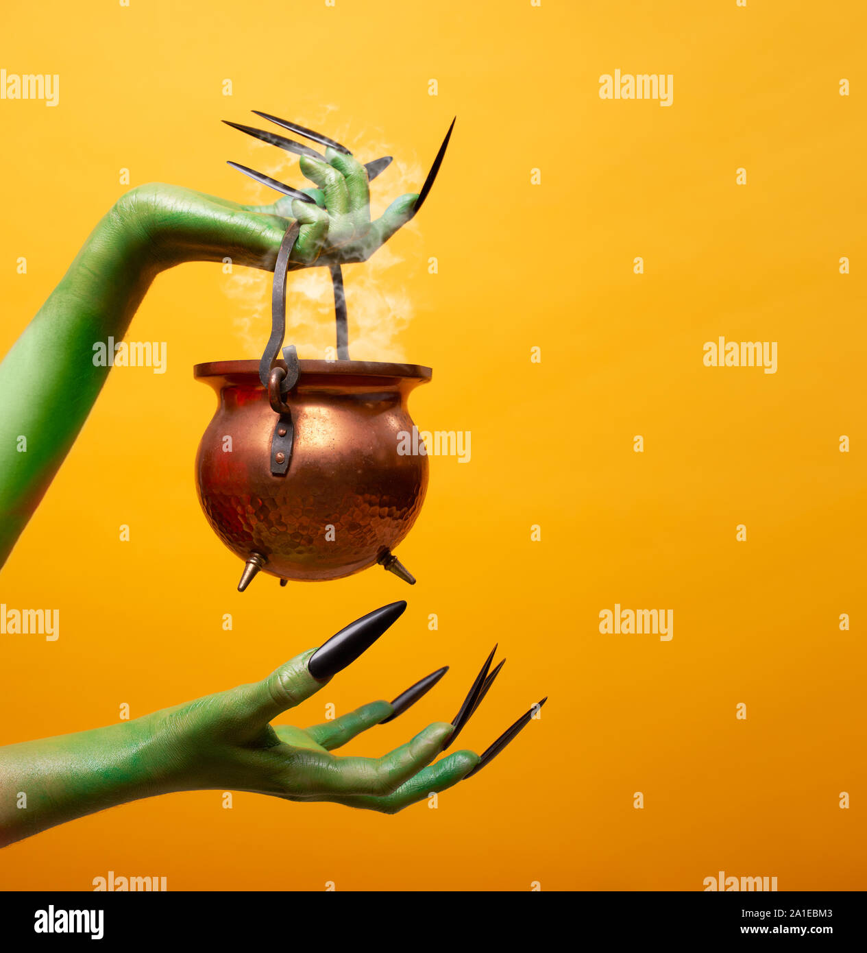 Image of two green troll hands with bowler hat on empty orange ...