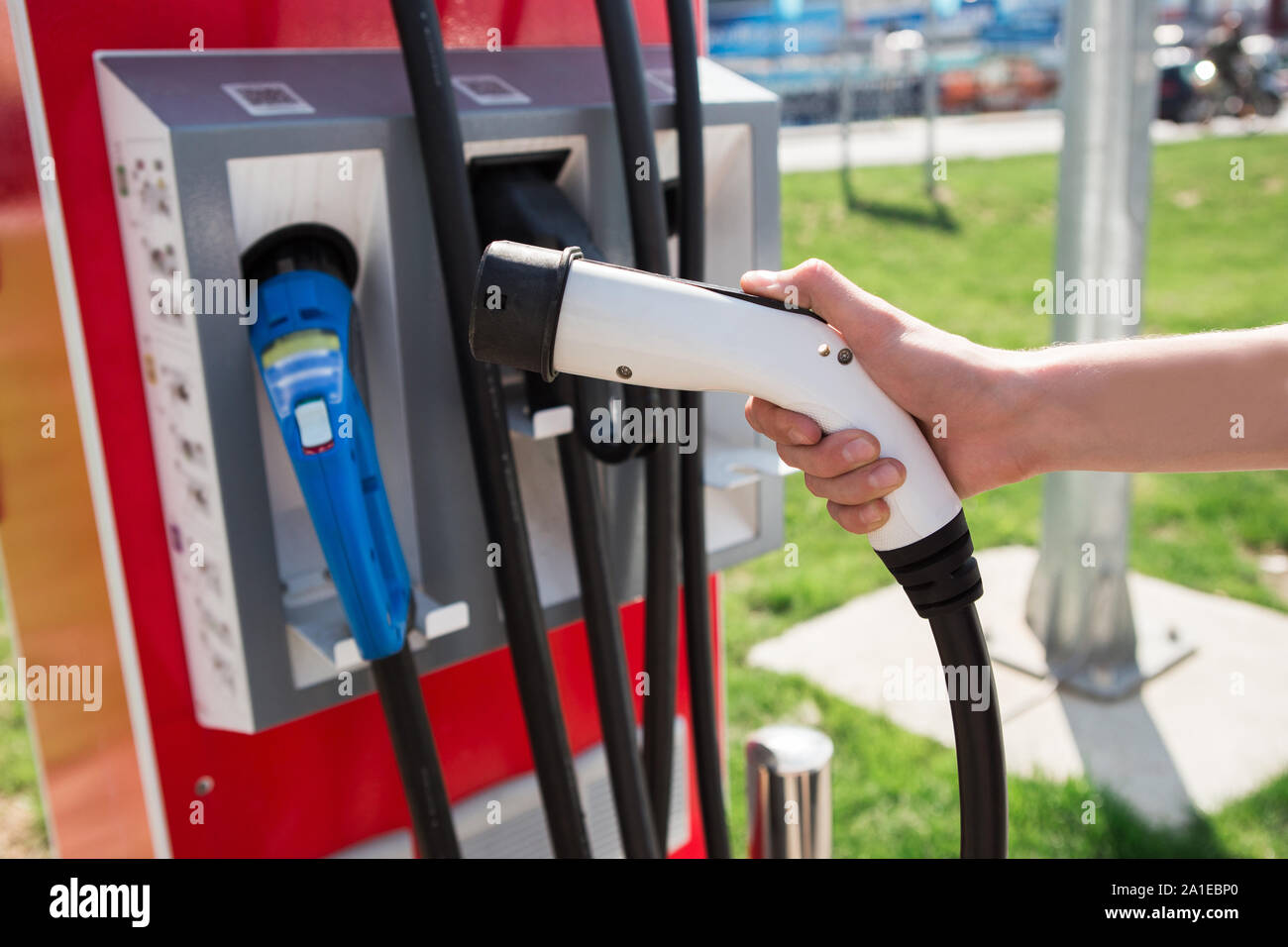 Hand holding electric outlet hi-res stock photography and images - Alamy