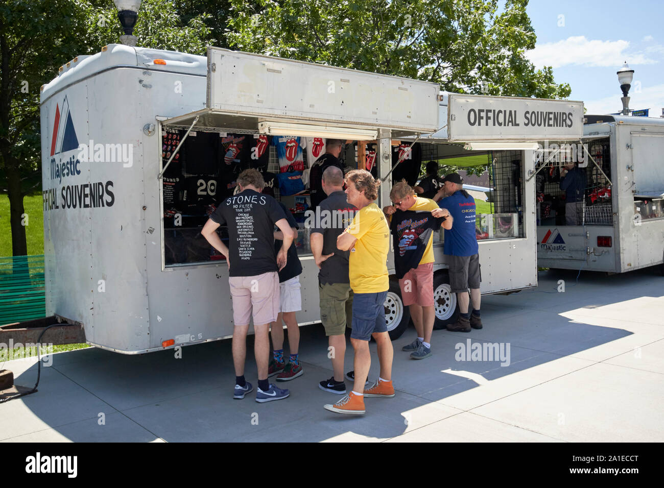 middle aged men at merch trailer at rolling stones concert chicago ...
