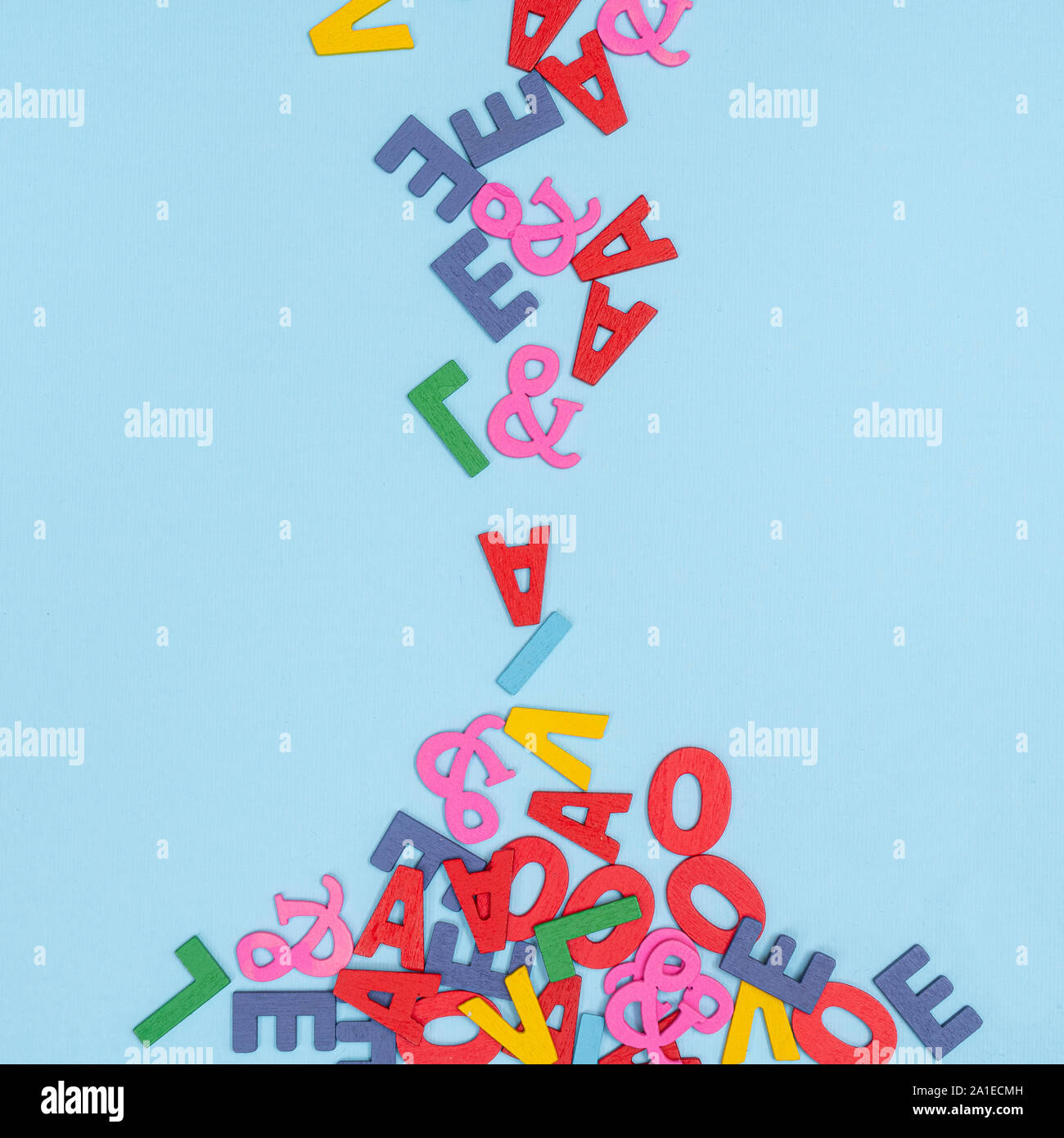 some letters of the colorful alphabet in scattered order on a colored ...
