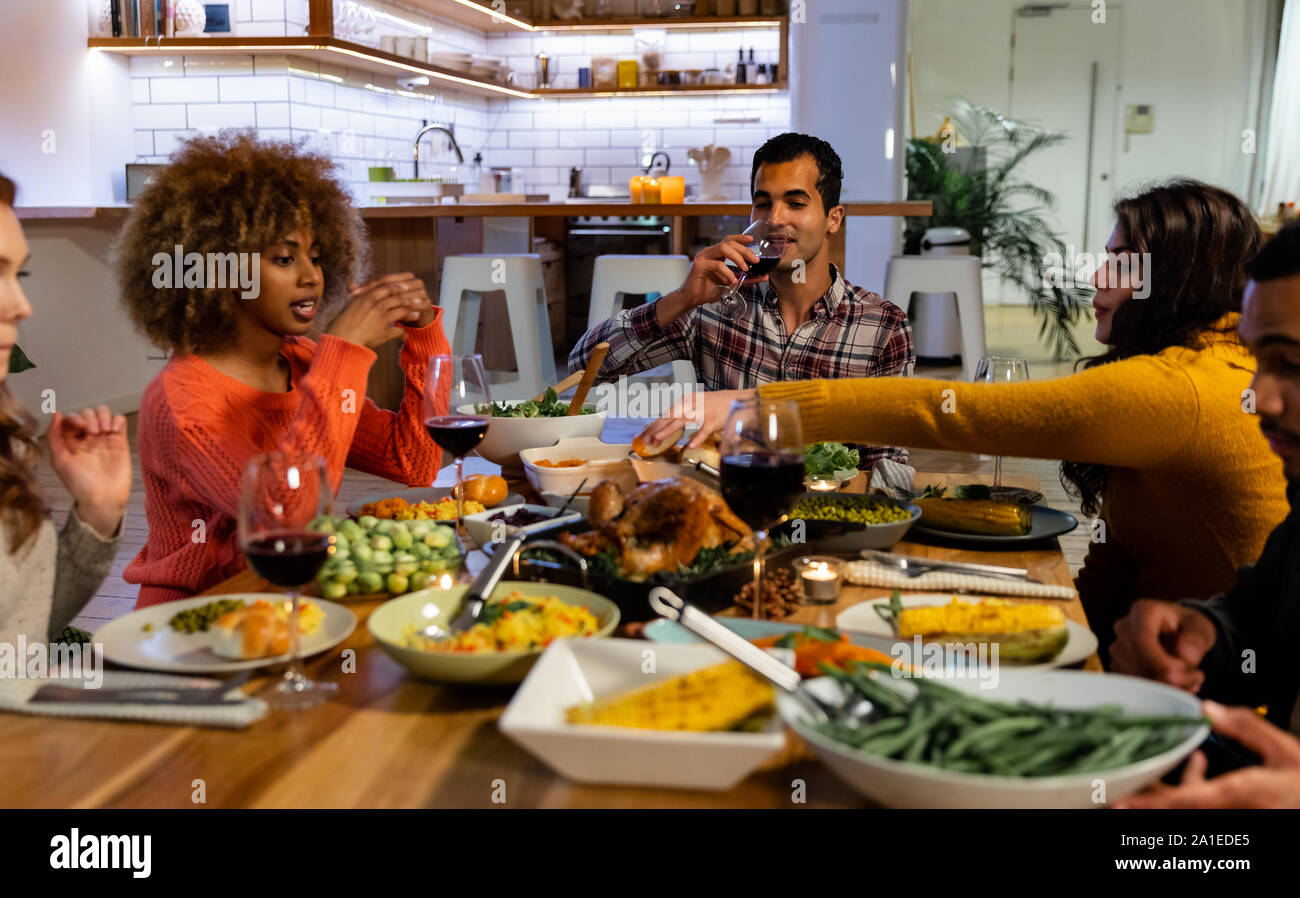 Eating meal home friends table hi-res stock photography and images - Alamy