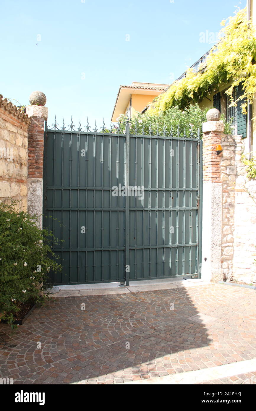 Big metal entry gate hi-res stock photography and images - Alamy