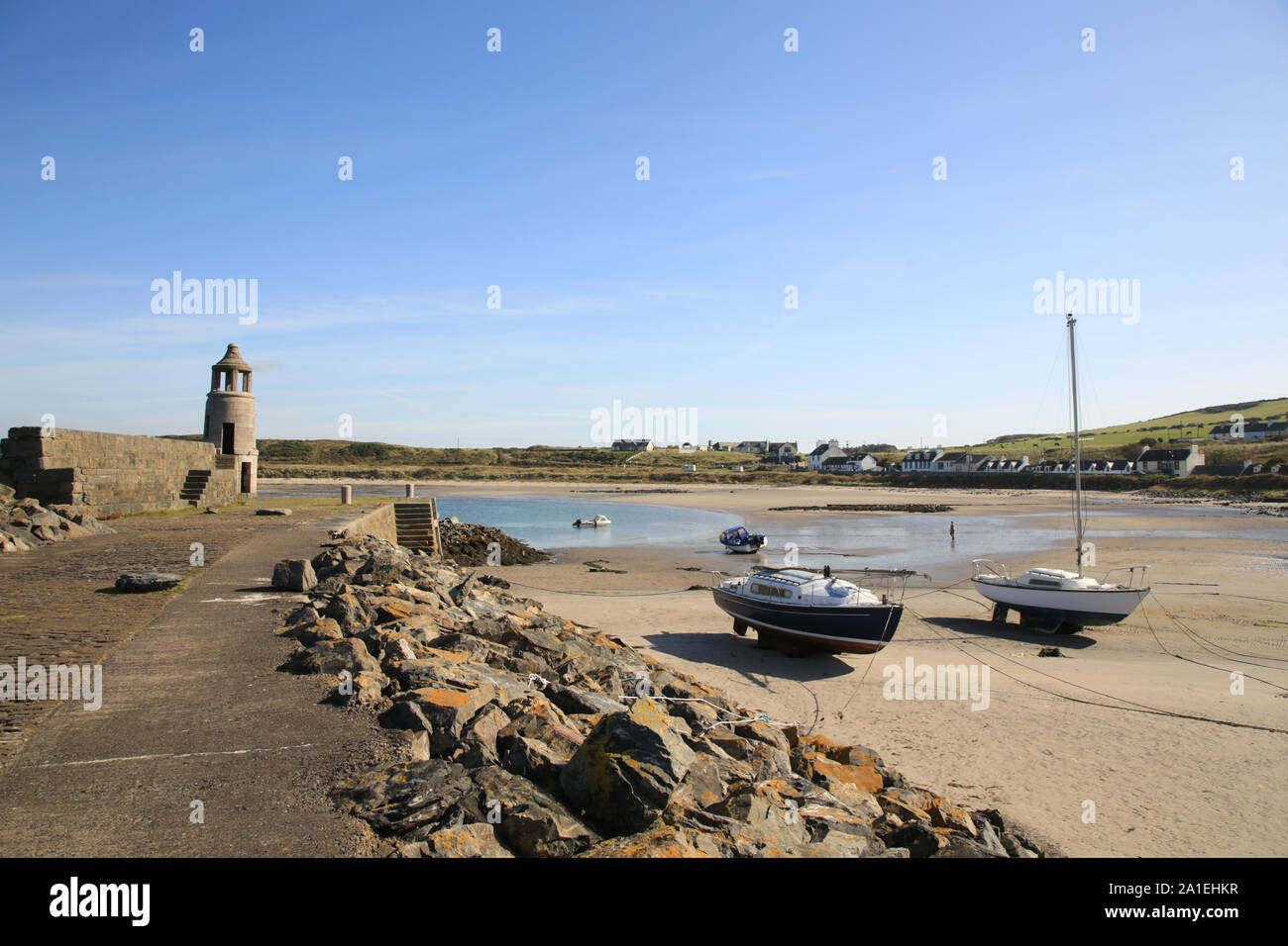 View of Port Logan beach and harbour wall, Dumfries and Galloway ...