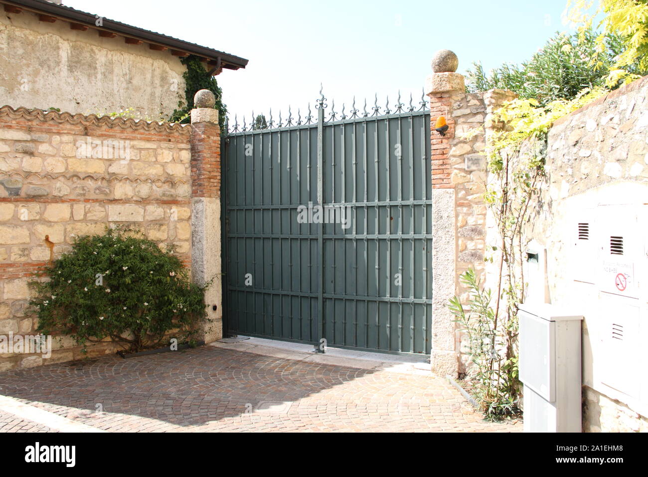 Big metal entry gate hi-res stock photography and images - Alamy