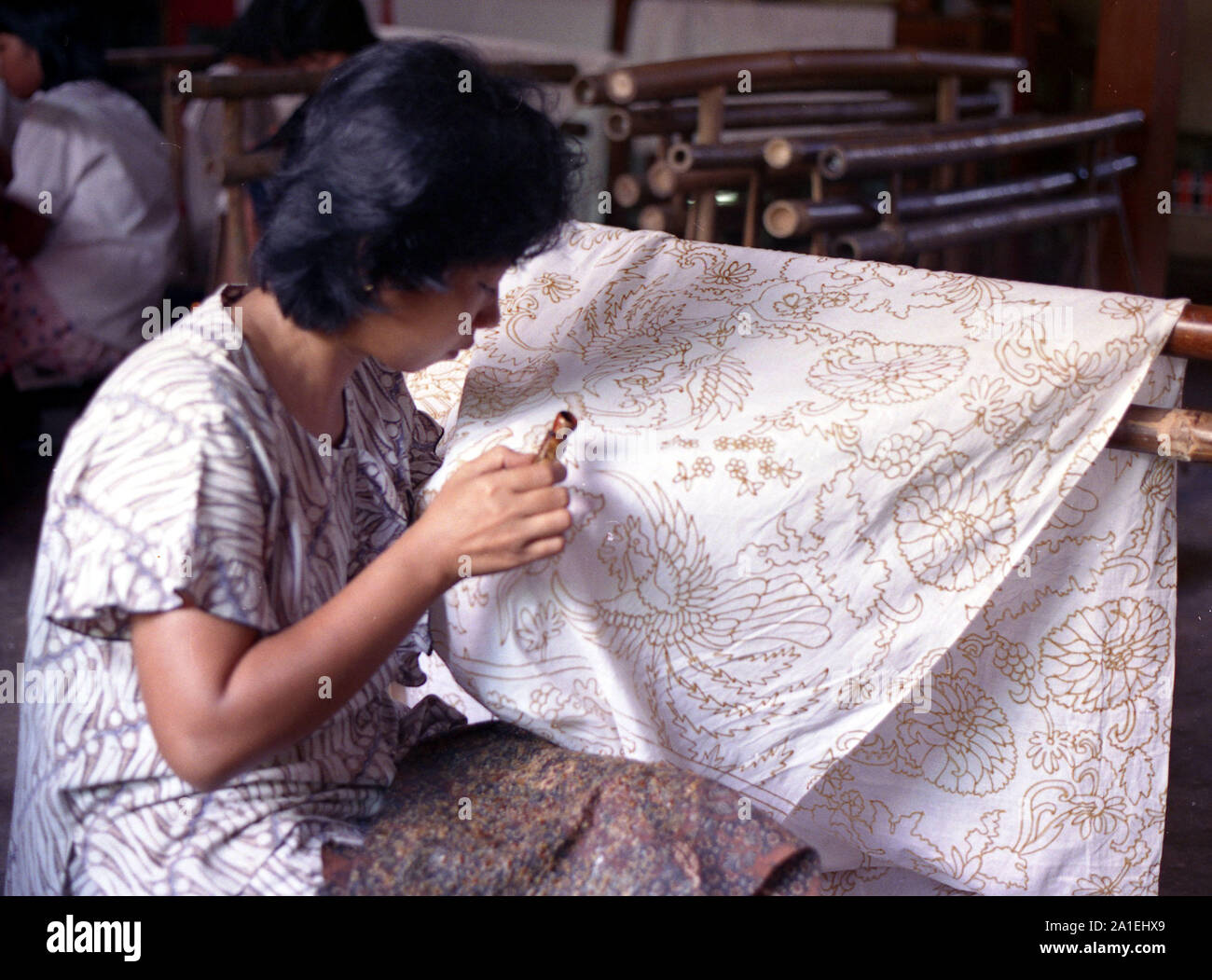 Making batik tulis with a canting, Yogyakarta, Java, 1989 Stock Photo ...