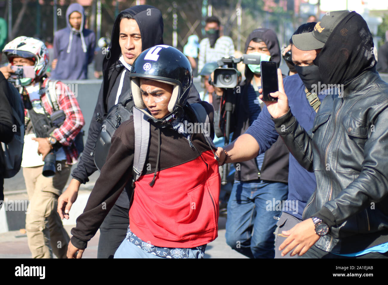 Plainclothes police officers hi-res stock photography and images - Alamy