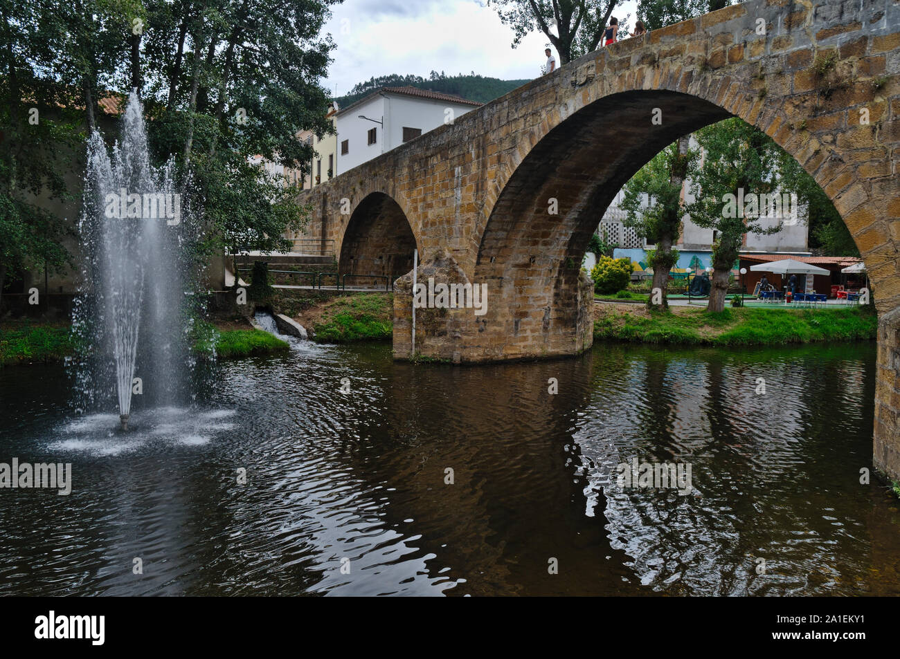 Antique bridge in the village of Gois. Coimbra, Portugal Stock Photo ...