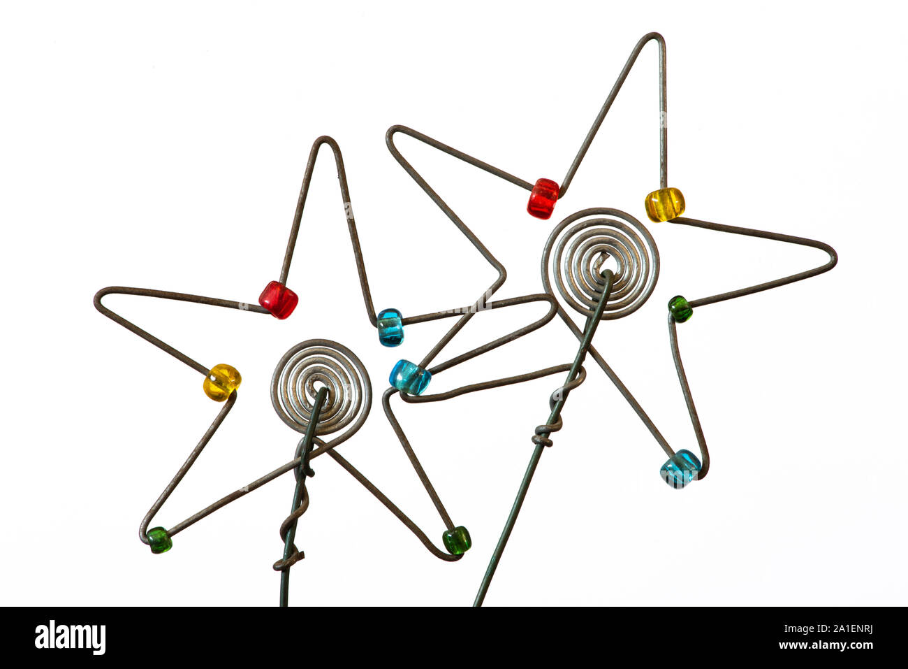 Two iconic but simple Christmas stars created out of wire and beads ...