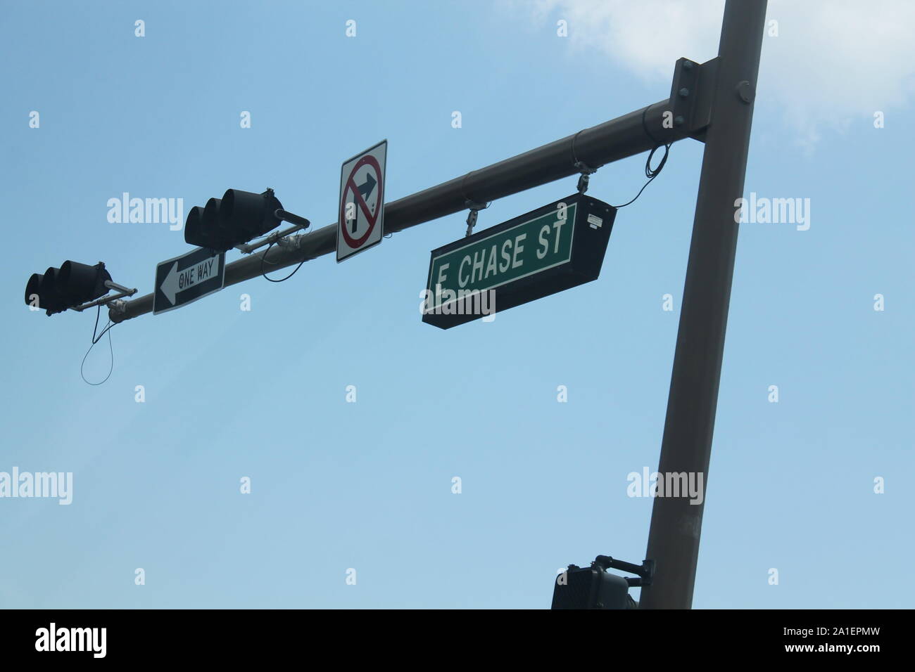 Road sign saying "E Chase St" and "One Way Stock Photo - Alamy