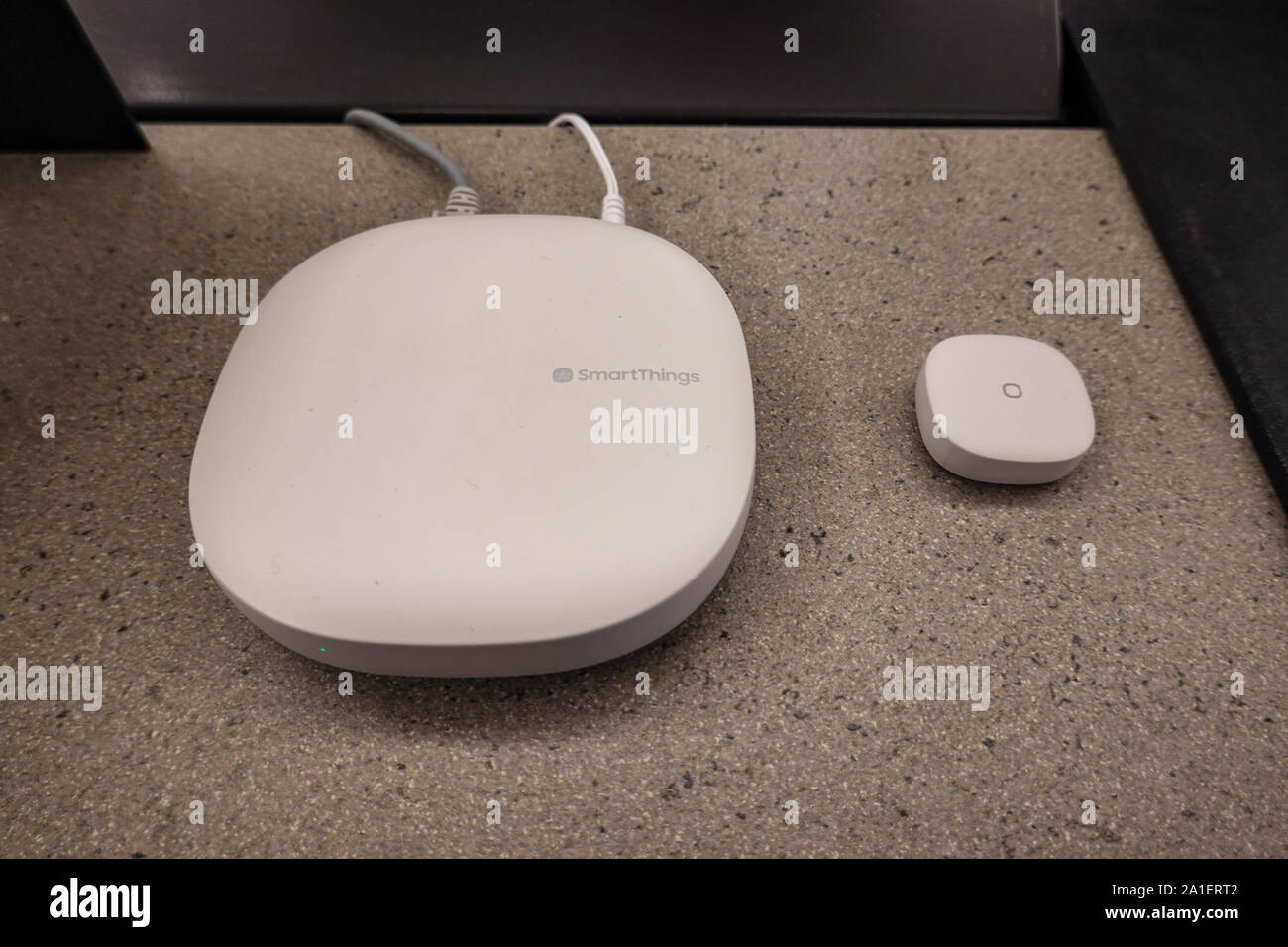 Seattle, WA/USA-9/15/19: A SmartThings Hub and button on display at an ...