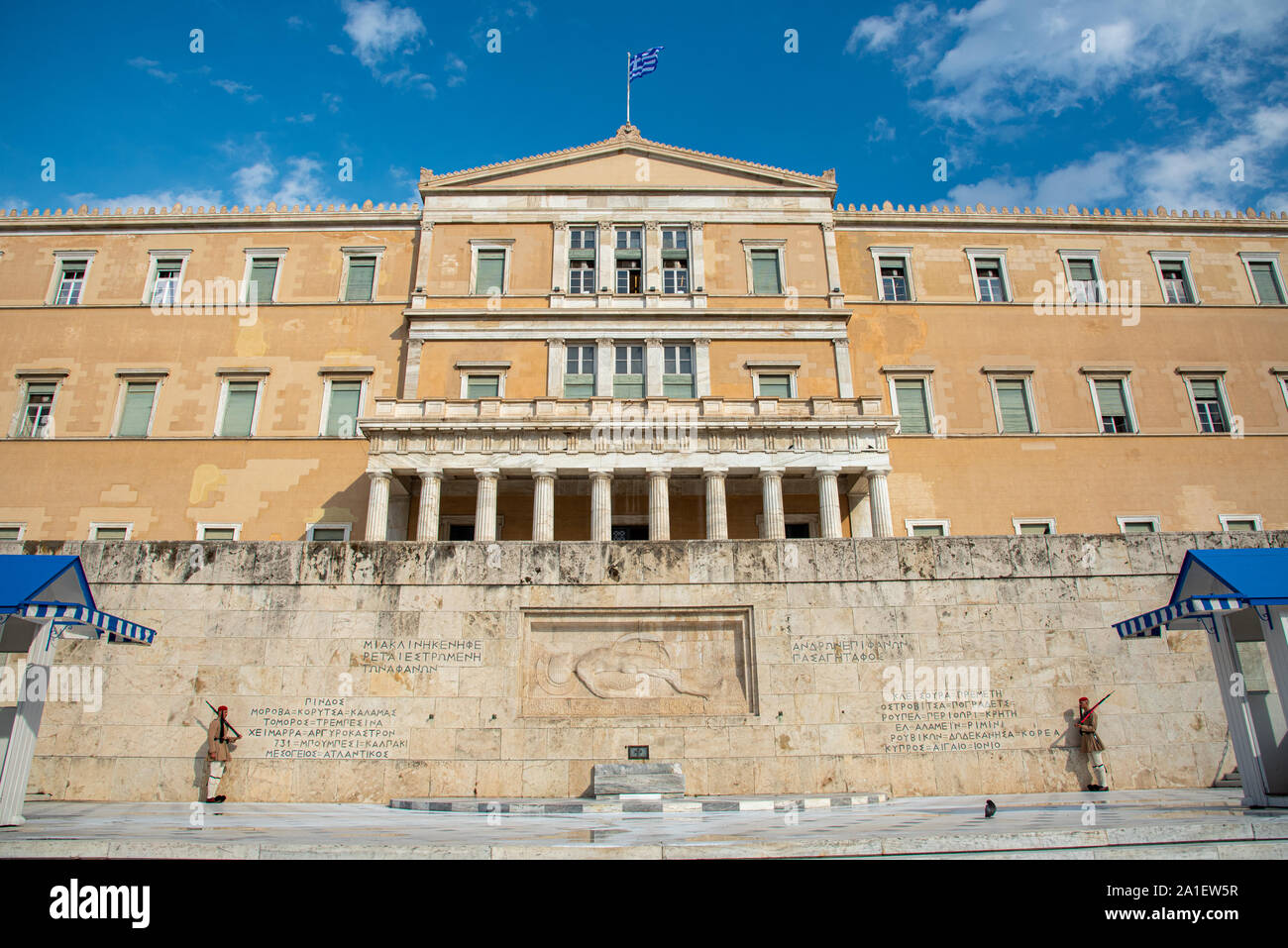 Evzone Greek soldiers with traditional dressing and guns parading in ...