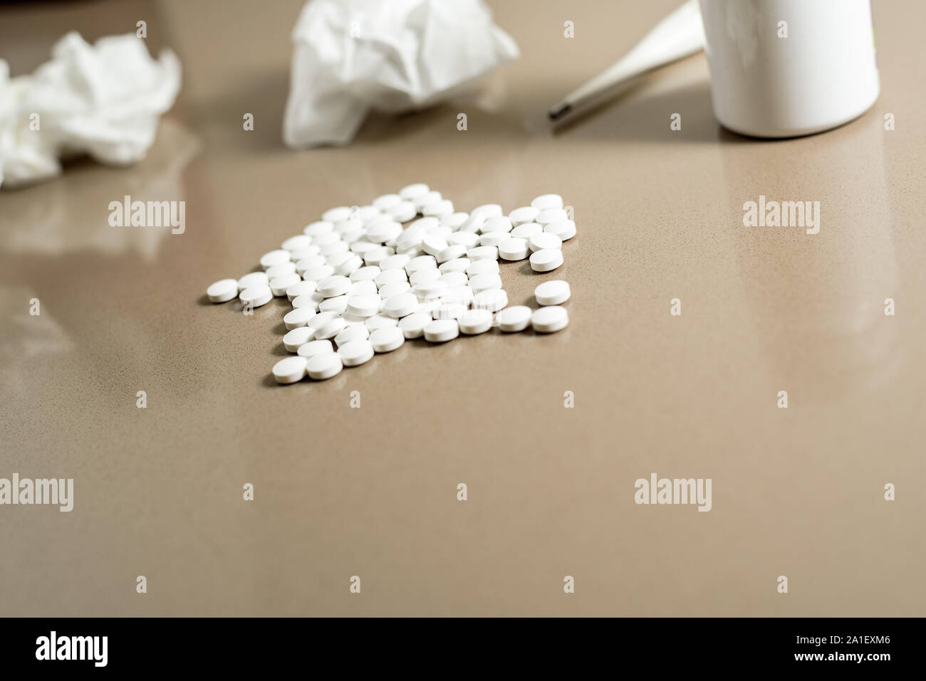 White pills to treat the common cold in winter, isolated on white ...