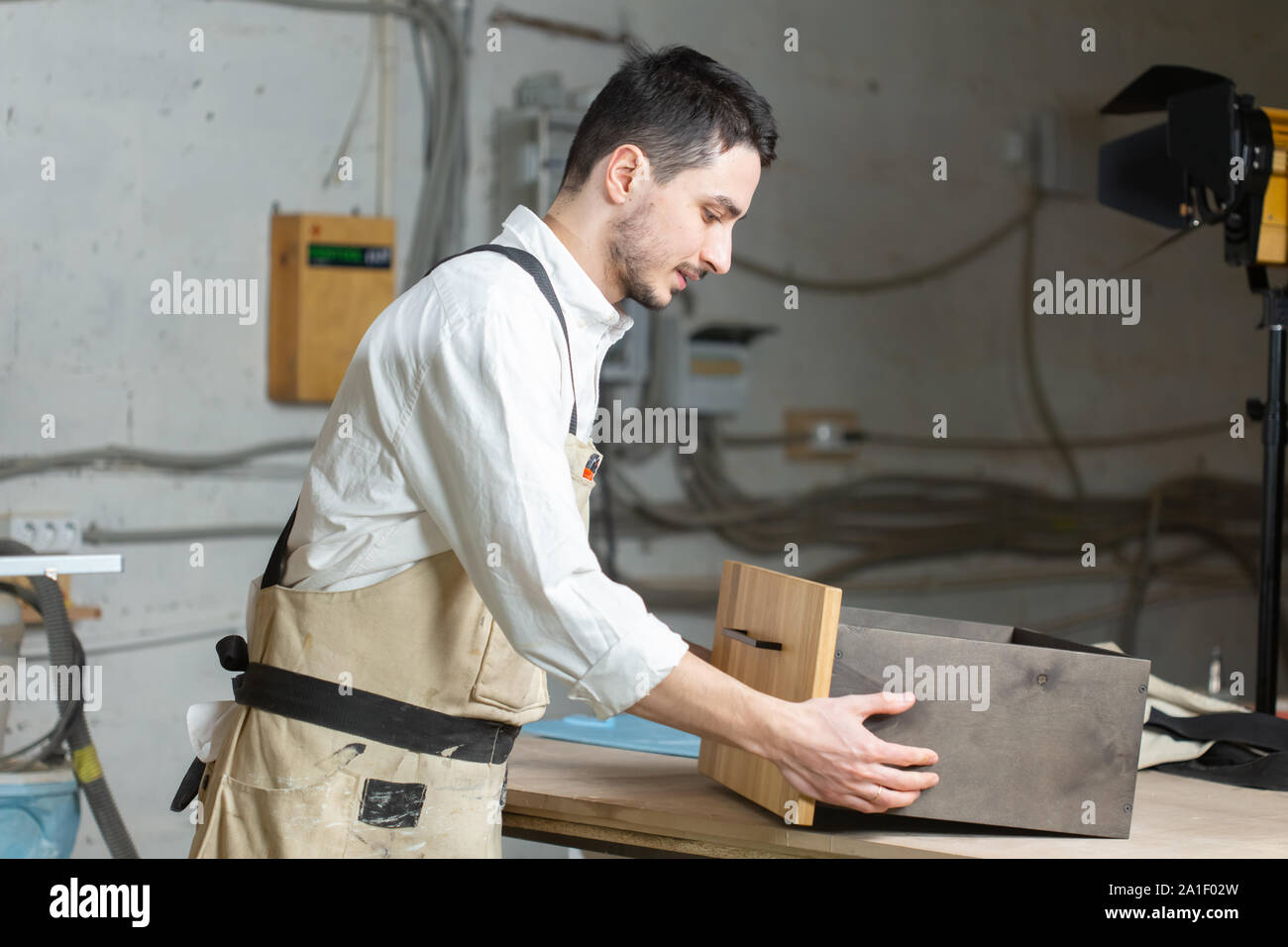 Furniture factory and small and medium sized enterprises concept - Man ...