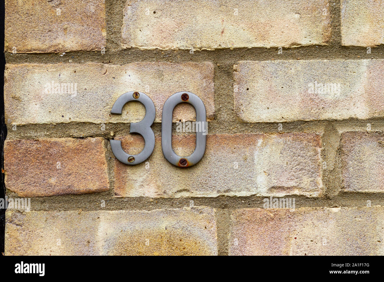 Numbers in brick hi-res stock photography and images - Alamy