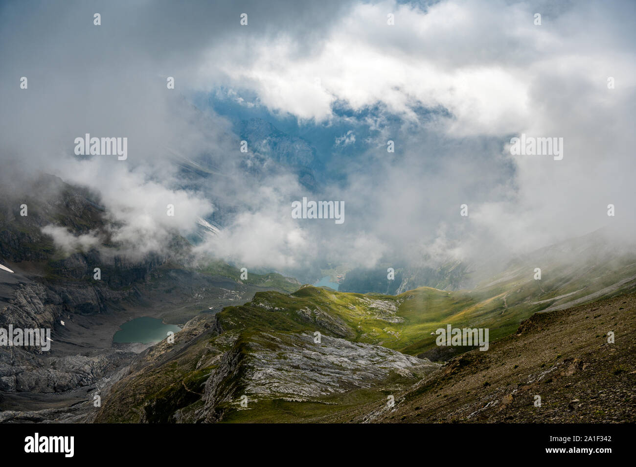 deep hanging clouds over Rossbode See on a rainy summer afternoon Stock ...