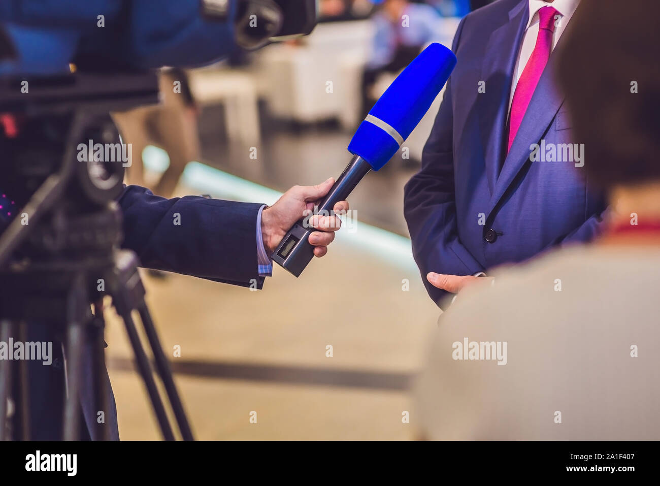 Asian reporter interviewing hi-res stock photography and images - Alamy