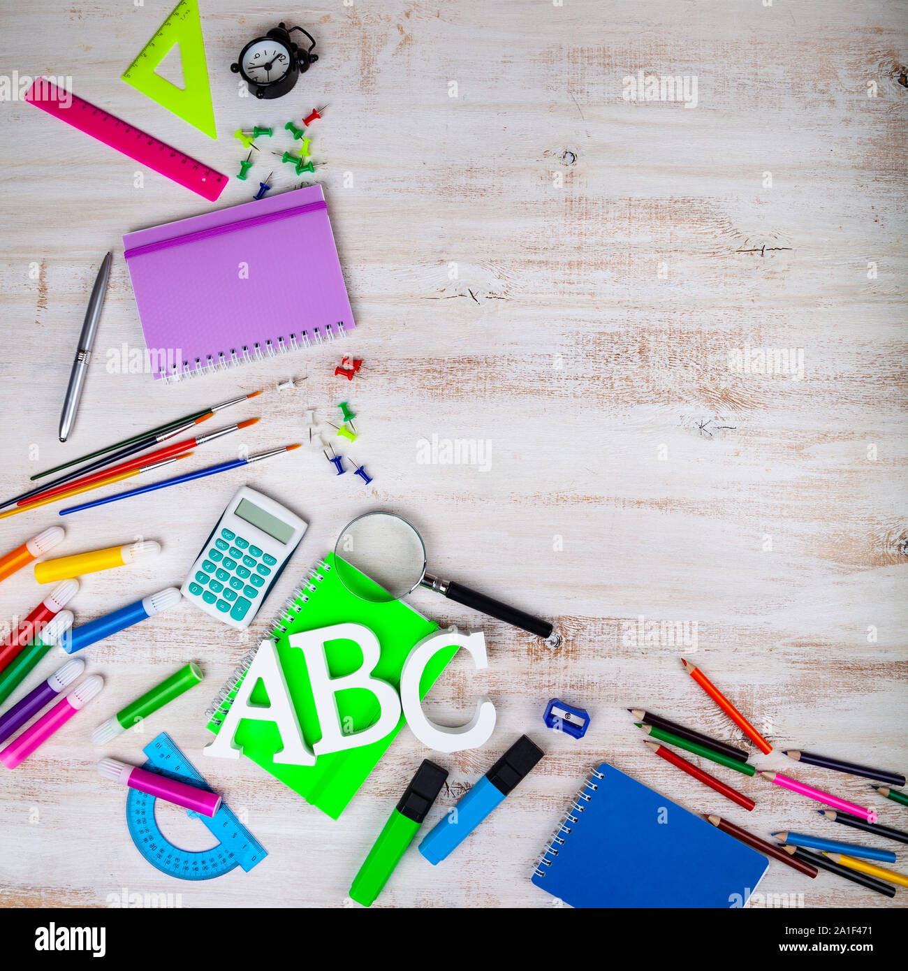 Back to school. Items for the school on a wooden table. Place for your ...