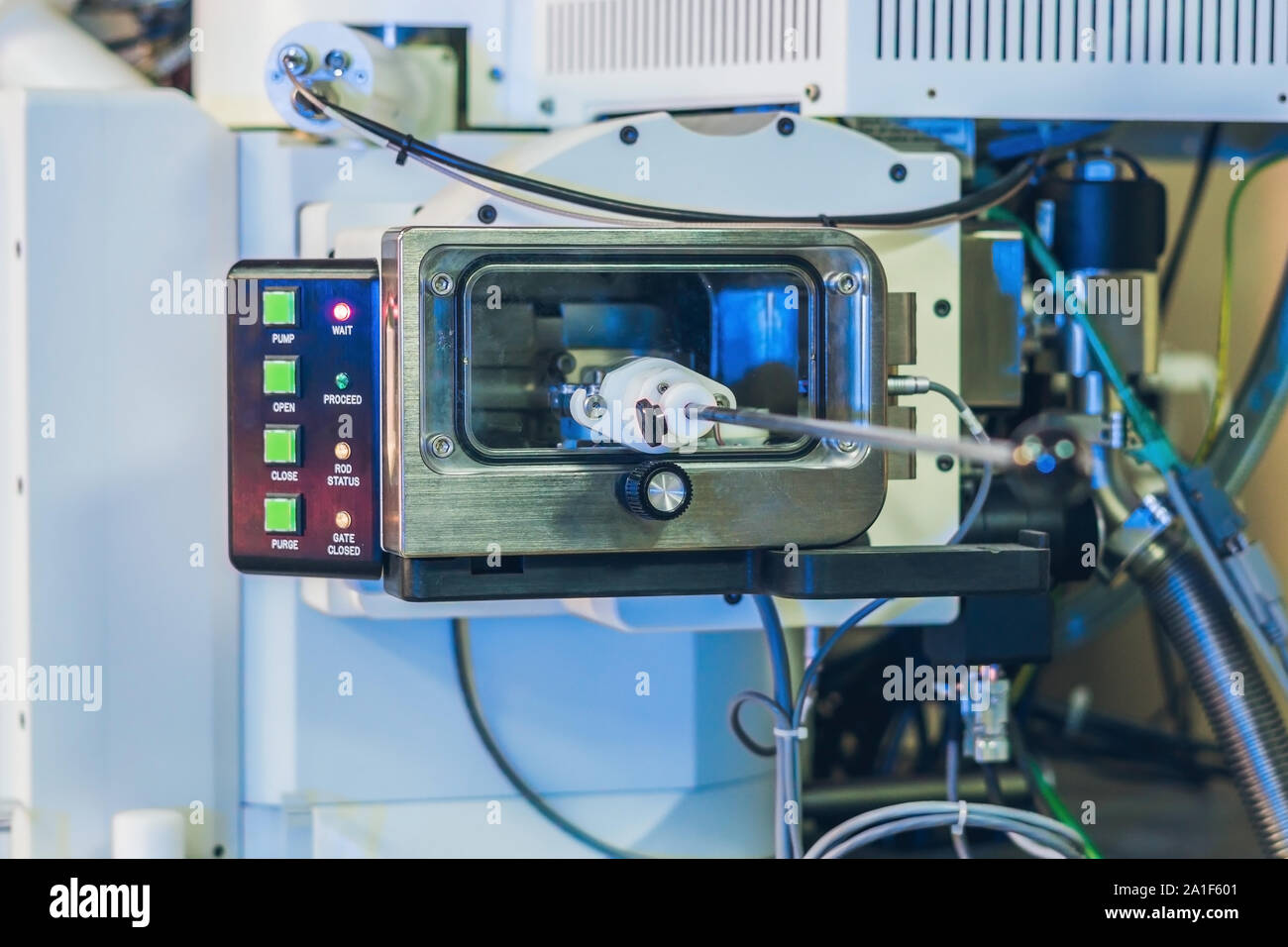 Scientist in a laboratory works with an electron microscope gateway ...