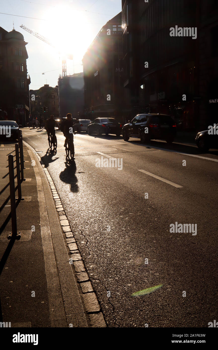 Zurich,Switzerland,July 23, 2019: silhouettes of cars and bikes on busy ...