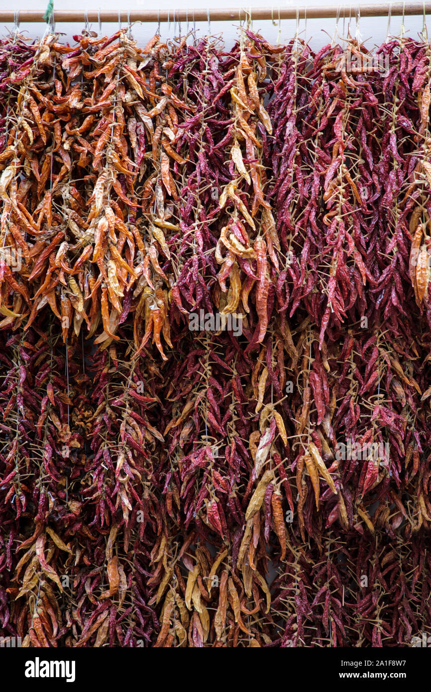 background image of lots of dried chilli peppers hanging up Stock Photo ...
