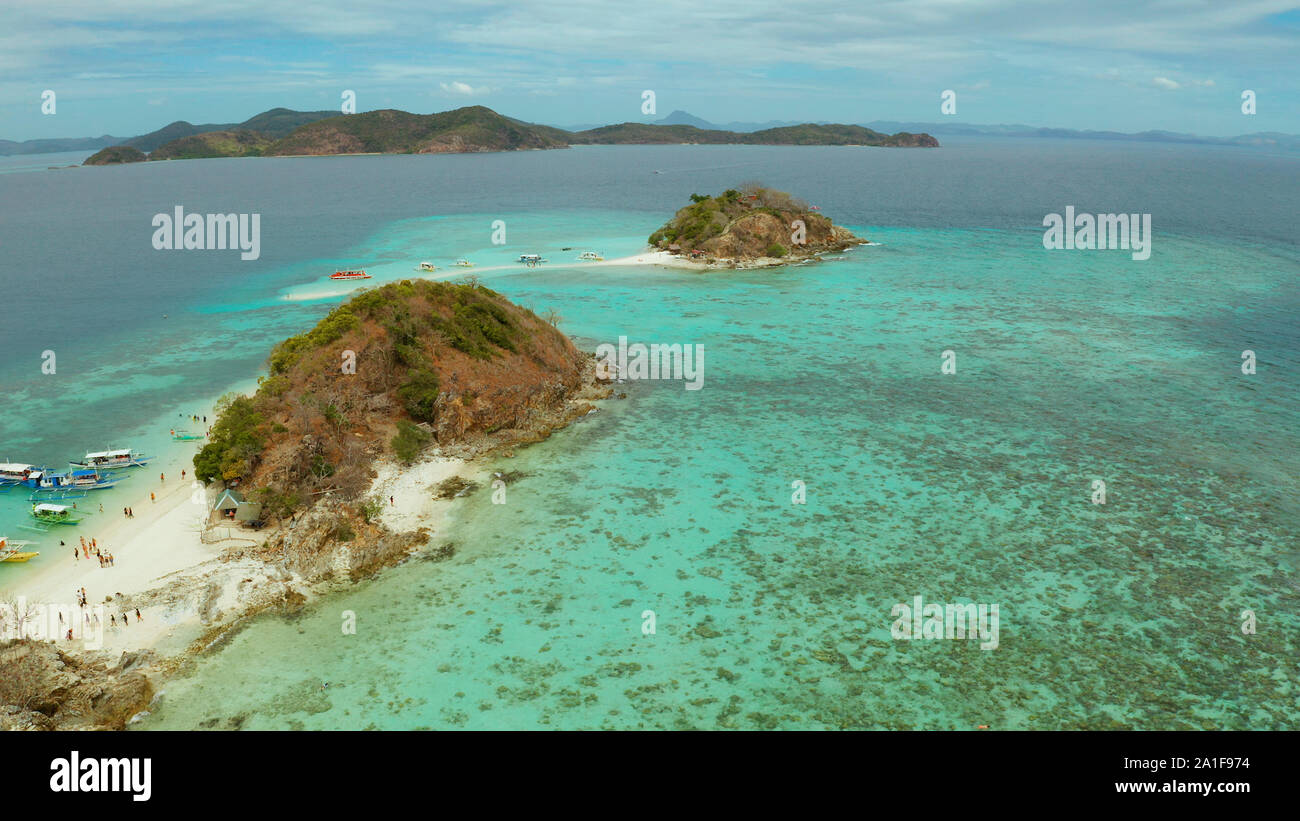 aerial view tropical island with sand white beach. Bulog Dos ...
