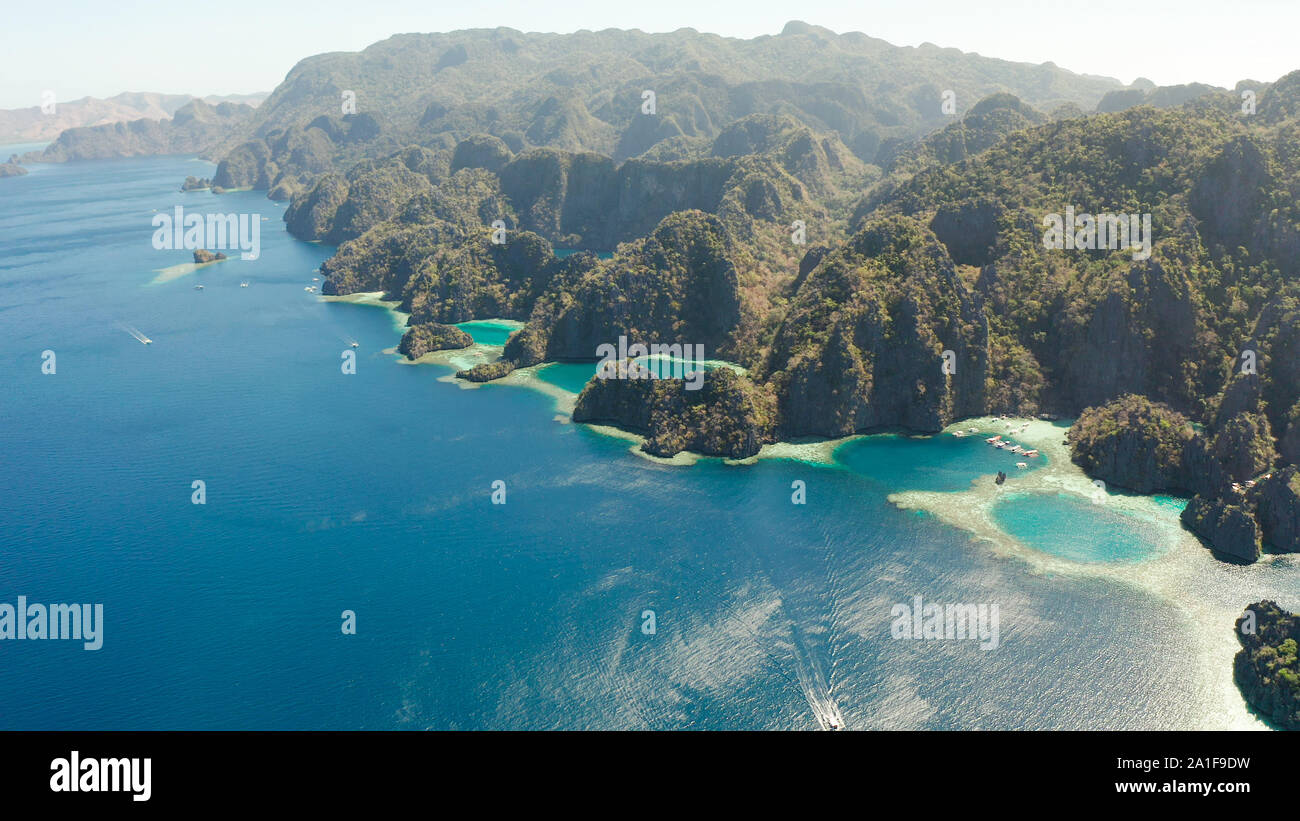 Tourist boats around the beautiful big and small lagoons, aerial view ...