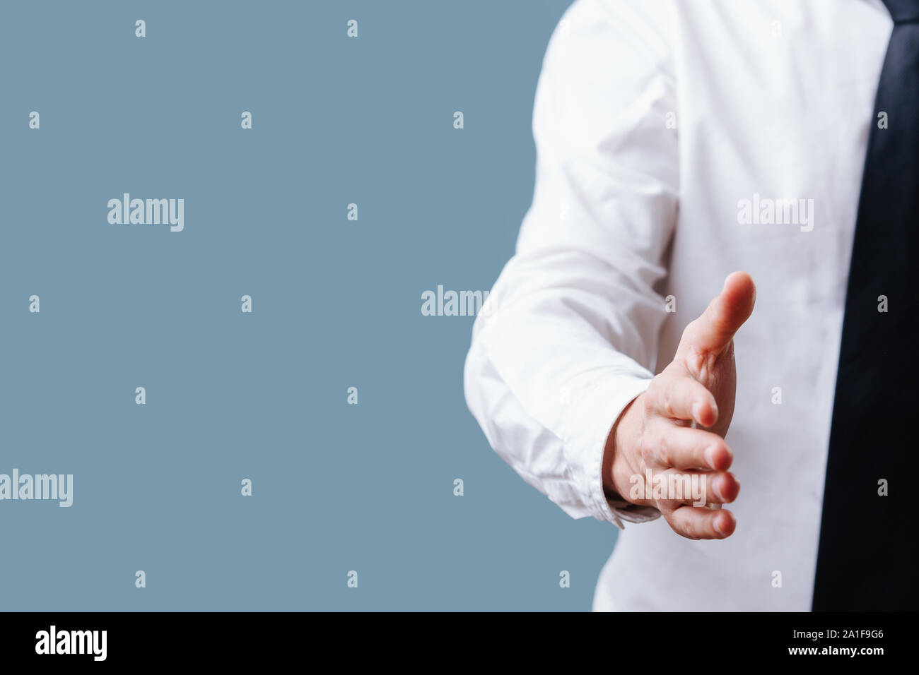 Businessman extending hand hi-res stock photography and images - Alamy