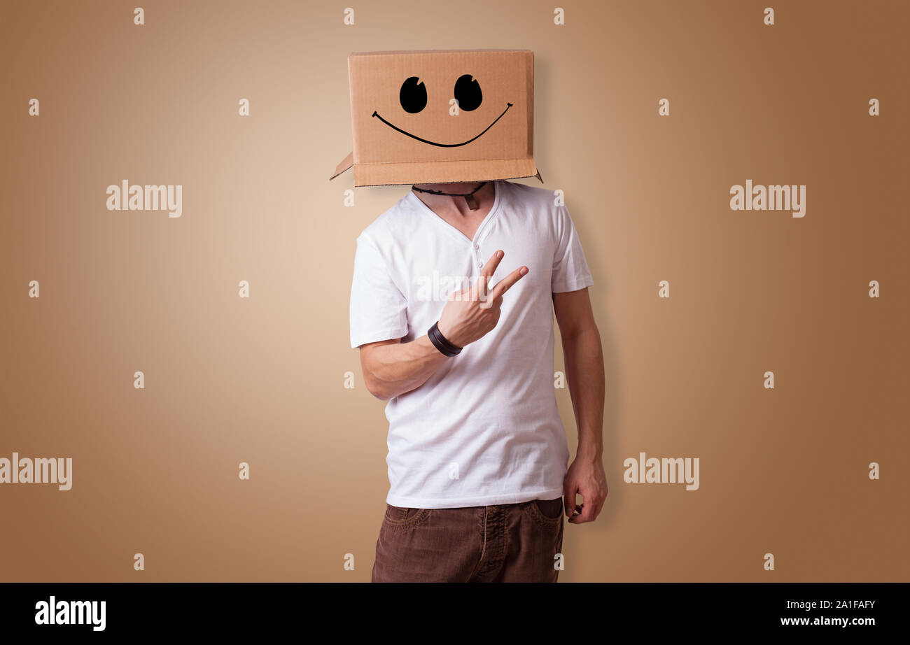 Man with cardboard box head Stock Photo - Alamy