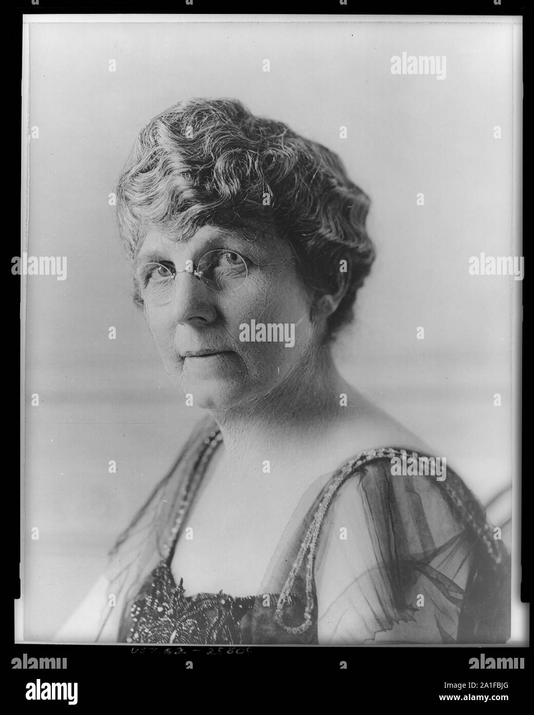 Mrs. Warren G. Harding, three-quarter length portrait, seated, facing ...