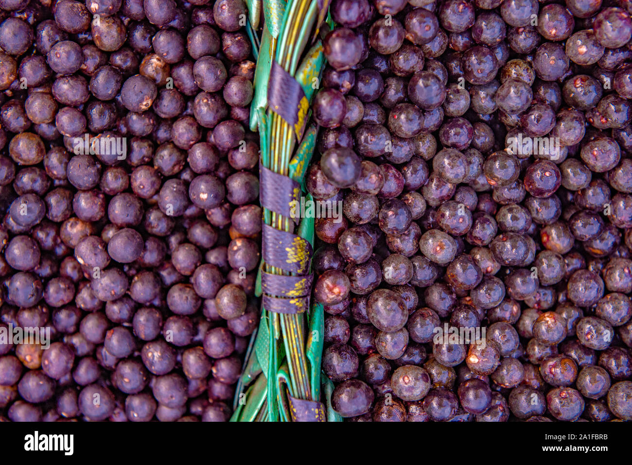 Closeup of acai berries, an exotic fruit from Amazon, on baskets Stock ...
