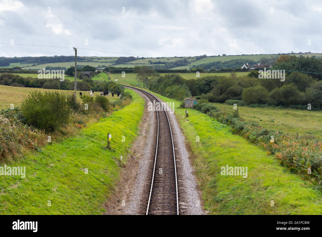 Single track railway line running between Corfe and Swanage in Dorset ...