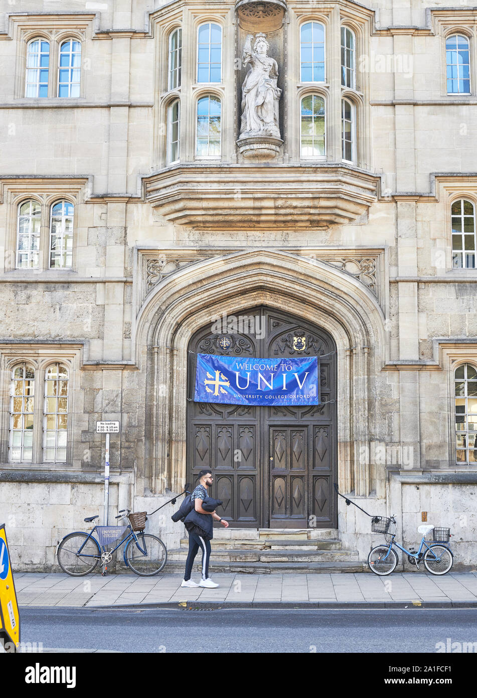 A male student passes the entrance on High street to University college ...