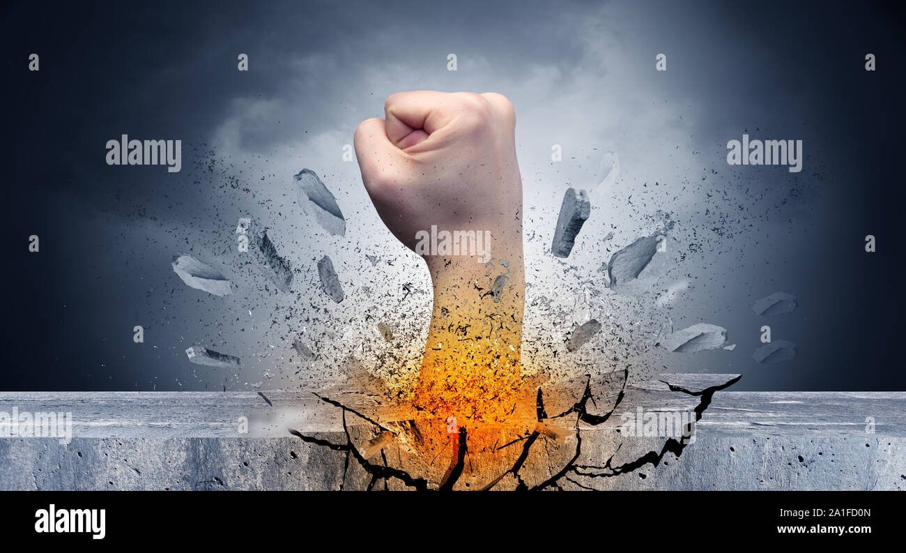 Big hand hits intense and breaks a crass stonewall Stock Photo - Alamy