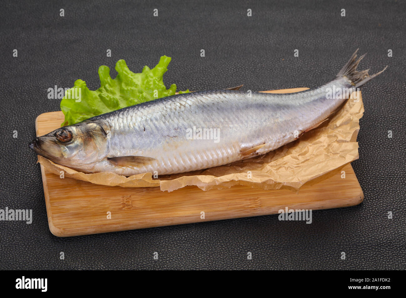 Salted herring fish ready for eat Stock Photo - Alamy