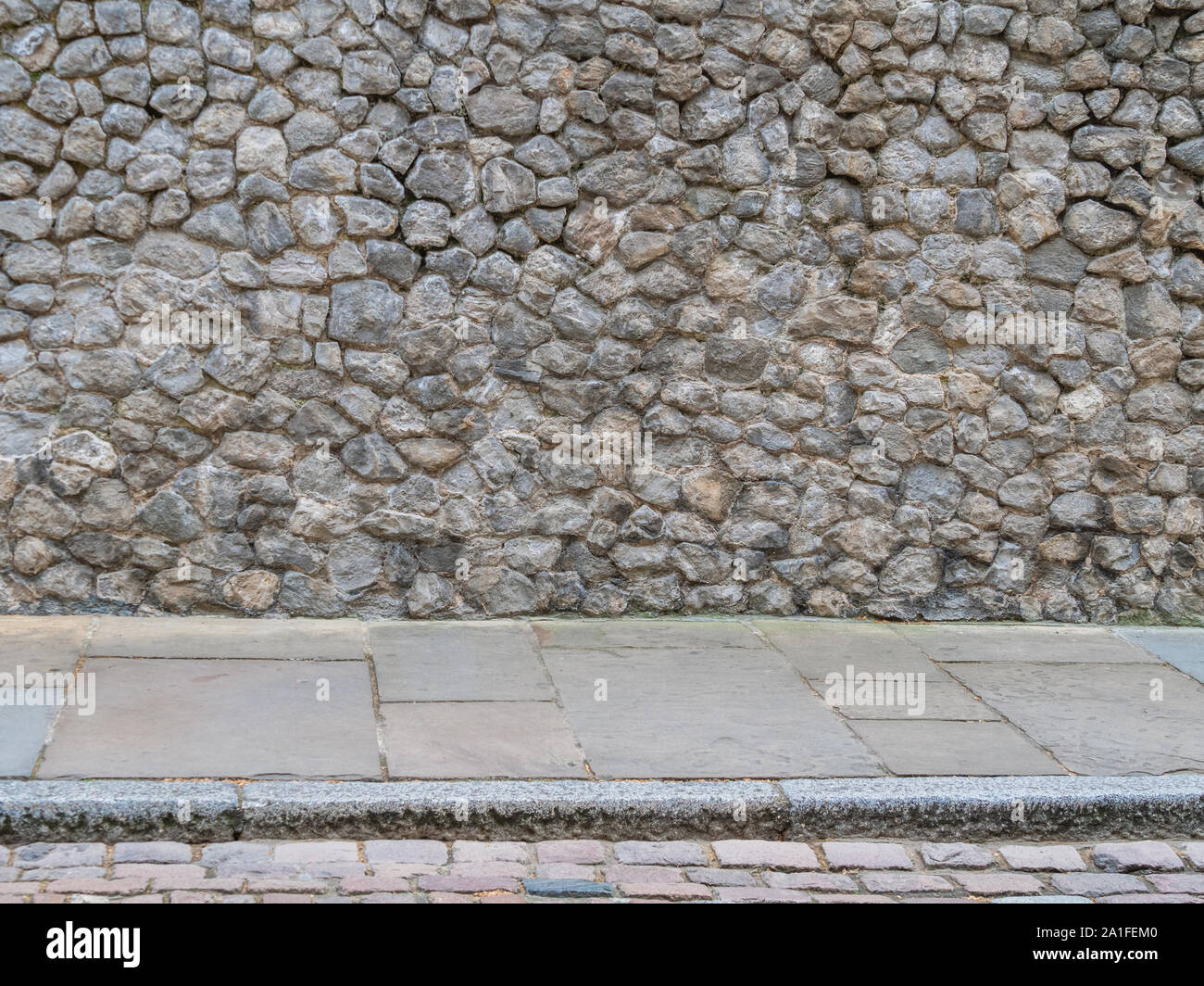 Solid cobblestone wall hi-res stock photography and images - Alamy