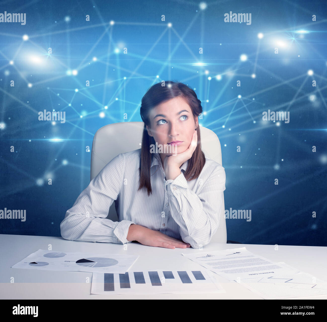 Manager in front of the office desk with networking concept Stock Photo ...