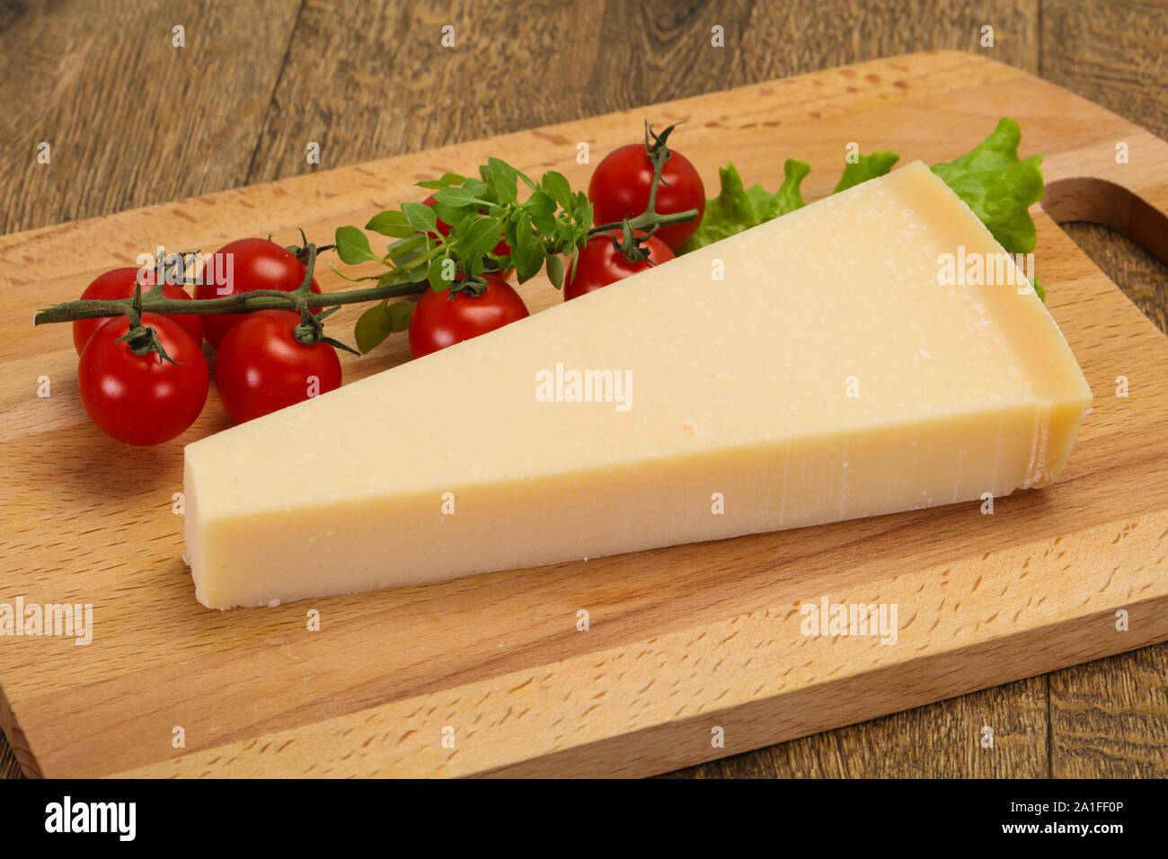 Italian traditional parmesan cheese triangle served salad Stock Photo ...