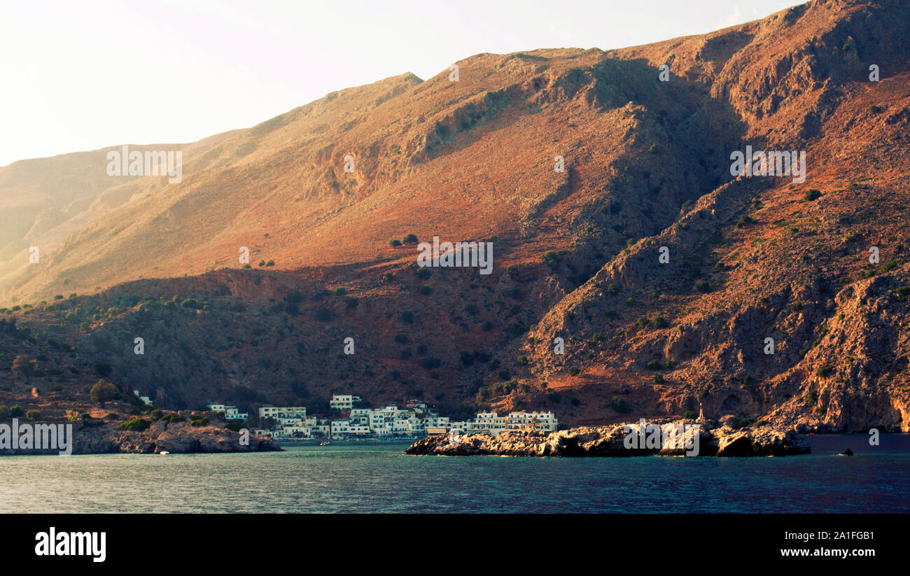 Beautiful sunset at isolated coast village of Loutro, Sfakia, Crete ...