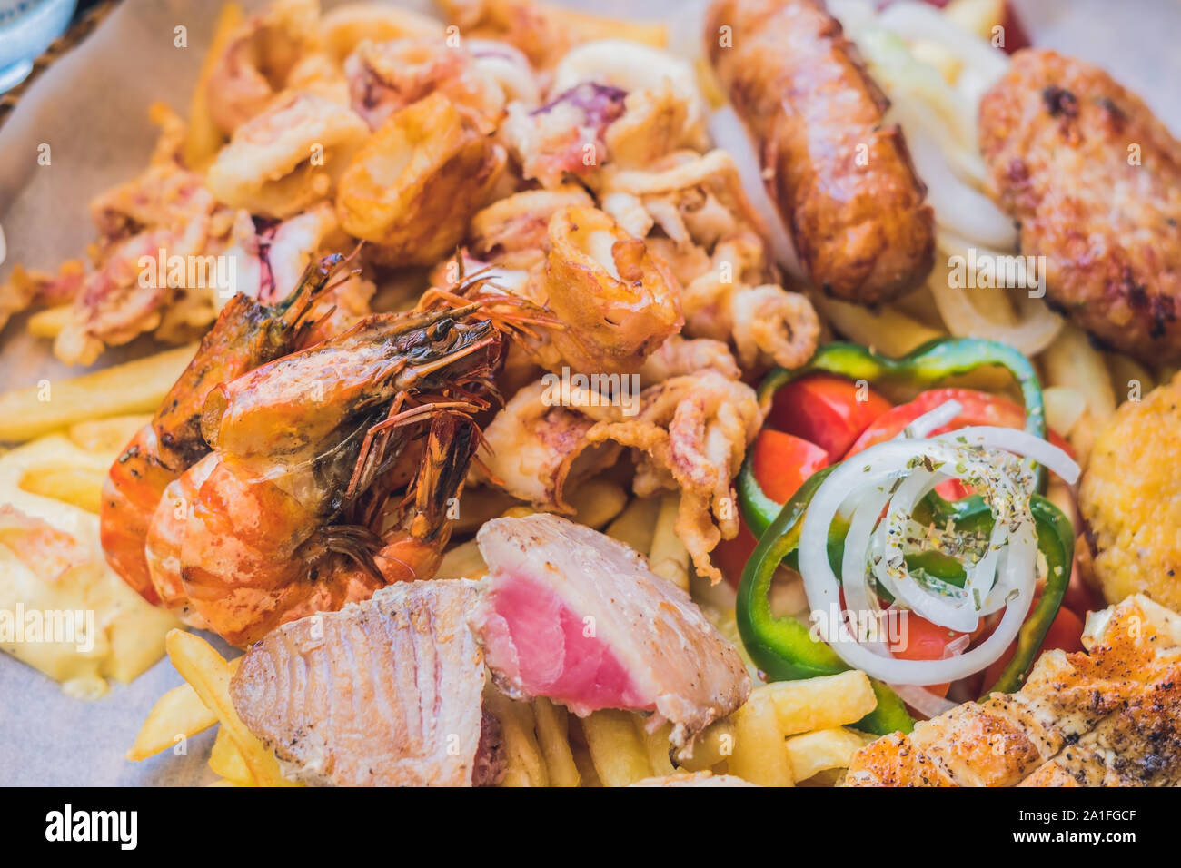 Big set Greek food Meat plate with potatoes and sauce Stock Photo - Alamy