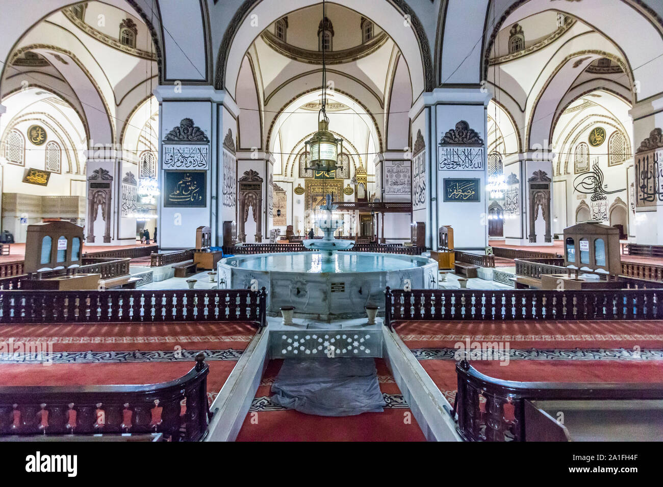 An interior view of the Great Mosque. They visit Ulu Cami, the biggest ...