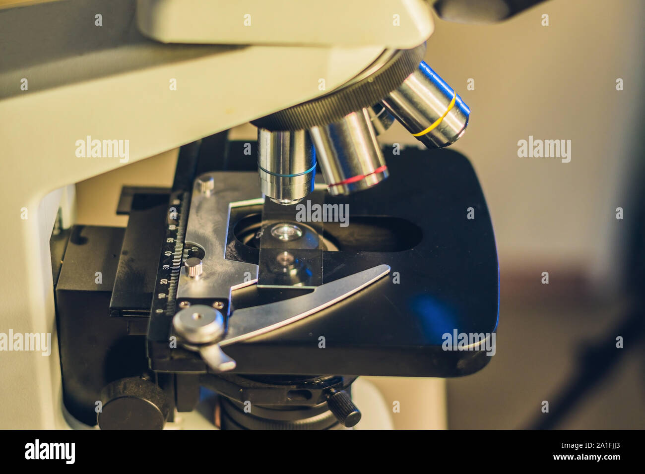 Optical microscope with four different objective lenses Stock Photo - Alamy